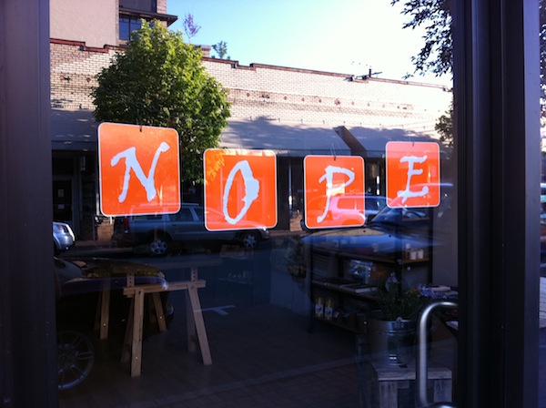 A storefront OPEN sign with a movable letter 'N', so you can make it ...